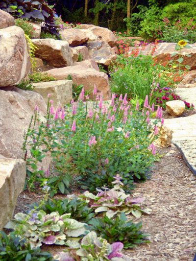 Creating Beauty and Structure with a Rock Wall Garden - Garden Therapy